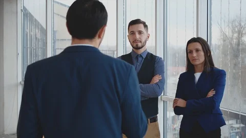 Boss is giving directions to his collegu... | Stock Video | Pond5