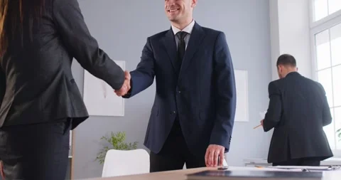 Boss Shaking Hands With Employee During ... | Stock Video | Pond5