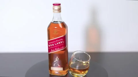 Bottle of Johnnie Walker Red Label whisk... | Stock Video | Pond5