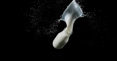 Falling Milk Stock Video Footage | Royalty Free Falling Milk Videos | Pond5