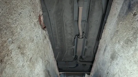 The bottom of car leaves the inspection ... | Stock Video | Pond5