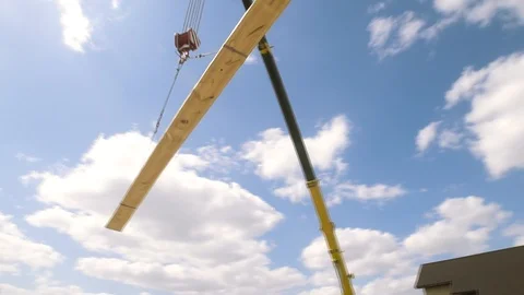 Bottom view of the crane carrying large ... | Stock Video | Pond5