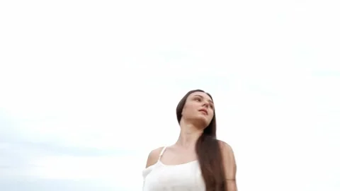 Bottom view of a portrait of a young bru... | Stock Video | Pond5