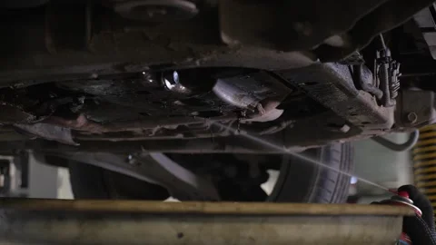 The bottom washing after oil change with... | Stock Video | Pond5