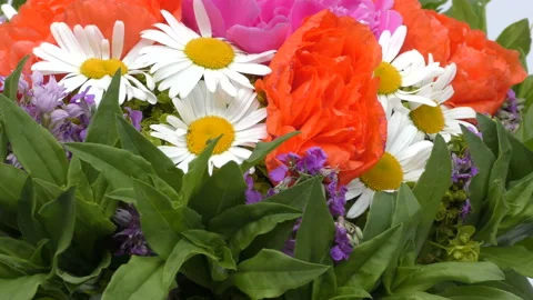 Bouquet of flowers isolated on white bac... | Stock Video | Pond5