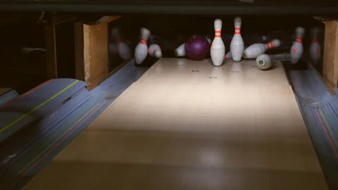 Bowling ball falls into a bowling alley.... | Stock Video | Pond5