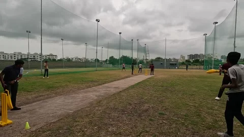 Box cricket scene, Youngster playing cri... | Stock Video | Pond5