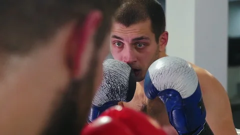 Box training - two sweaty men having an ... | Stock Video | Pond5