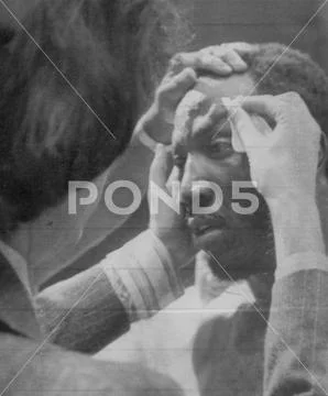 Boxer Lonnie Bennett Has The Cut Above His Left Eye Treated During ...