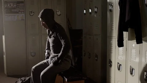 Boxer sitting on bench looking down focu... | Stock Video | Pond5