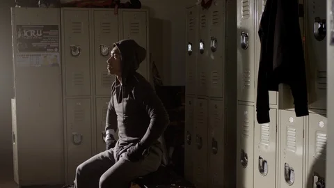 Boxer sitting on bench looking up in mus... | Stock Video | Pond5