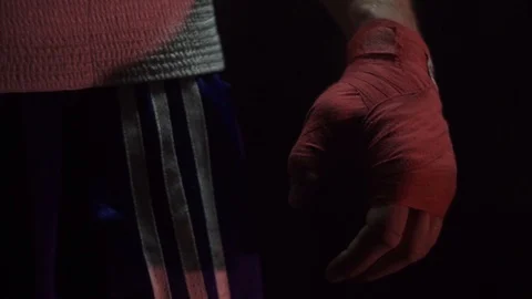 A boxer's red bandage on his hand isolat... | Stock Video | Pond5