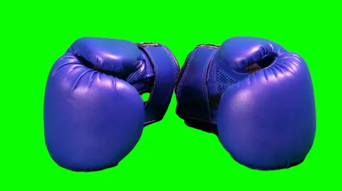 Boxing-gloves on a green background | Stock Video | Pond5