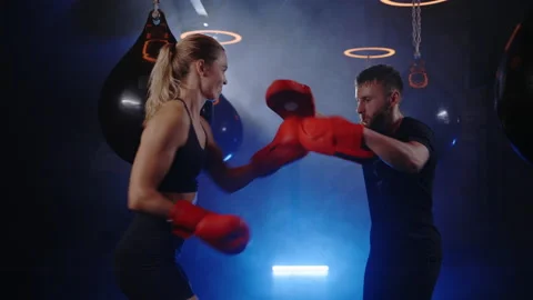 Boxing training. The woman is boxing wit... | Stock Video | Pond5