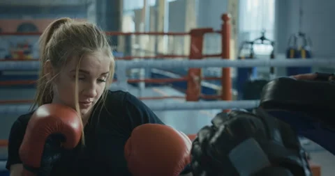 Boxing woman training with coach on ring | Stock Video | Pond5