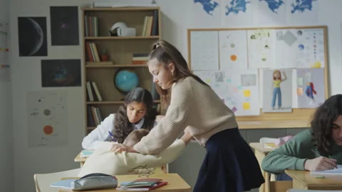Boy And Girl Fighting In Classroom | Stock Video | Pond5