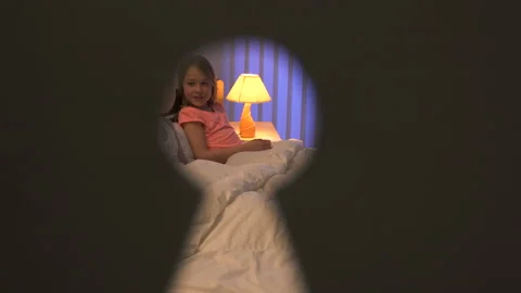 The boy and a girl laying on the bed. ev... | Stock Video | Pond5