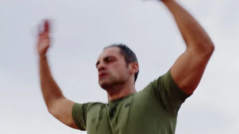 Boy is doing muscle warm-ups jumping jac... | Stock Video | Pond5