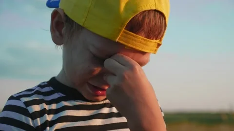 boy kid crying flowing tears a screaming... | Stock Video | Pond5