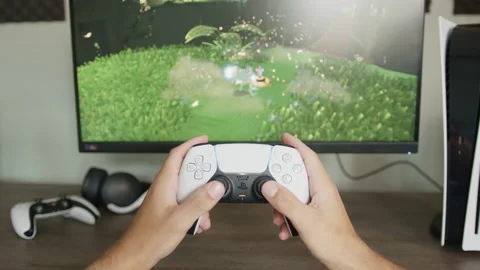 Boy Laying down his PS5 controller after... | Stock Video | Pond5
