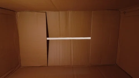 Boy opens big package and looks very hap... | Stock Video | Pond5