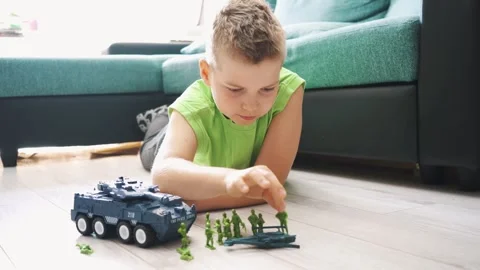 Boy Play Soldier Mini Figure Toy in the... | Stock Video | Pond5