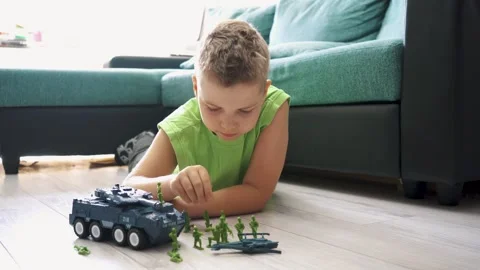 Boy Play Soldier Mini Figure Toy in the... | Stock Video | Pond5