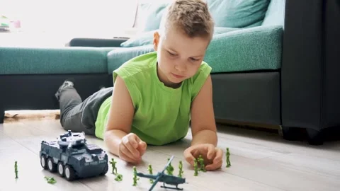Boy Play Soldier Mini Figure Toy in the... | Stock Video | Pond5