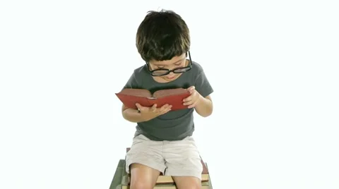 Boy Reading Book White Background (HD) | Stock Video | Pond5