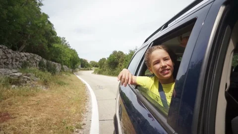 Boy schoolboy in the window of a moving ... | Stock Video | Pond5