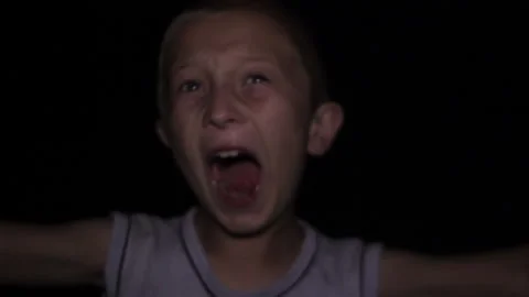 boy screaming at night | Stock Video | Pond5