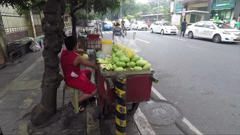 Boy Sells Mango, Street Food Stall, Road... | Stock Video | Pond5