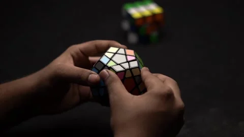 a boy solving a cube. rubik's cube solut... | Stock Video | Pond5