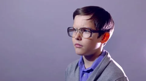 boy teenager nerd portrait think problem... | Stock Video | Pond5