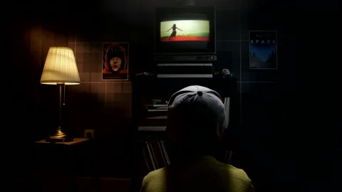 Boy watching movie on tv | Stock Video | Pond5