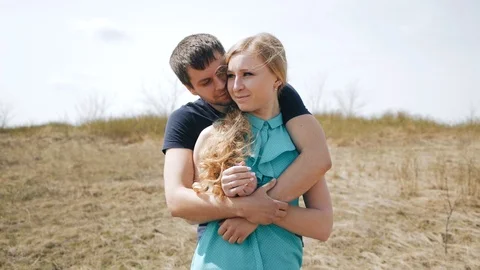 Boyfriend hugging his girlfriend. Loving... | Stock Video | Pond5