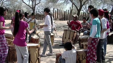 Boys and Girls Play Bombo Leguero in Out... | Stock Video | Pond5