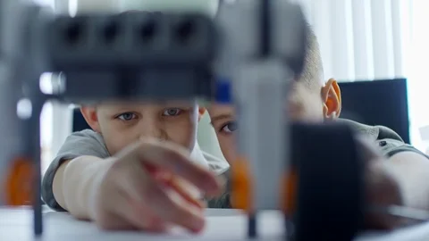 Boys Making Toy Model Together | Stock Video | Pond5