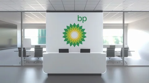 BP logo in modern office and a meeting r... | Stock Video | Pond5