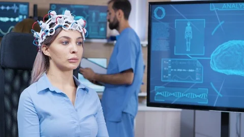 Brain activity on tv screen from female ... | Stock Video | Pond5