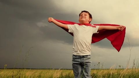 Brave child winner dream in red raincoat... | Stock Video | Pond5