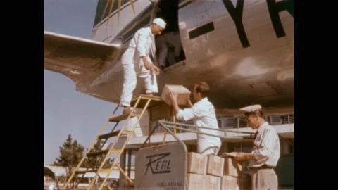 Brazil 1960s: Workers load boxes into th... | Stock Video | Pond5