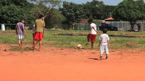Brazilian indigenous kids playing soccer... | Stock Video | Pond5