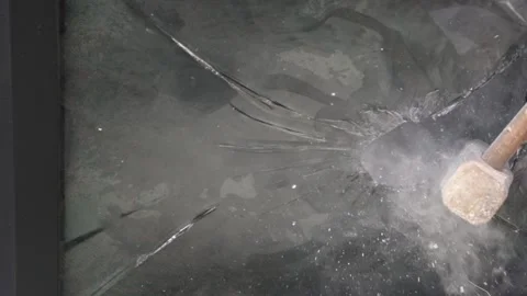 Breaking the TV with a sledgehammer. Bro... | Stock Video | Pond5