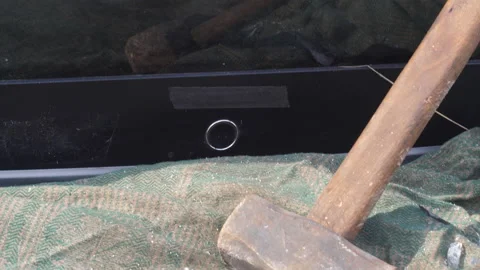 Breaking the TV with a sledgehammer. Bro... | Stock Video | Pond5