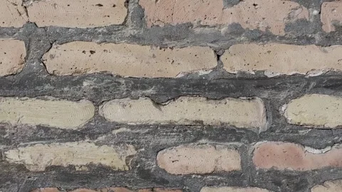 Brick wall made of thin bricks. Backgrou... | Stock Video | Pond5