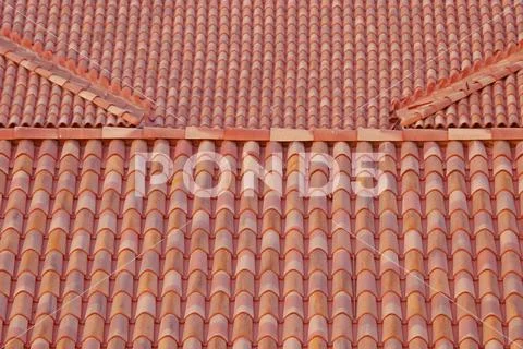 Bricks and roof tiles, italian style roof design ~ Hi Res #146029258