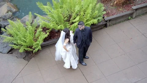 Bride grabs groom for first look and gro... | Stock Video | Pond5