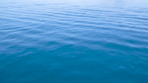 Bright calm blue deep ocean water ripple... | Stock Video | Pond5