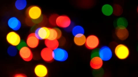 bright colored round lights on black bac... | Stock Video | Pond5